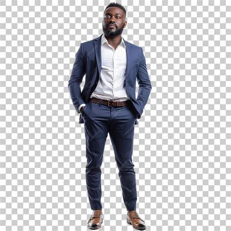 A Man In A Suit And Tie Is Standing In Front Of A White Background