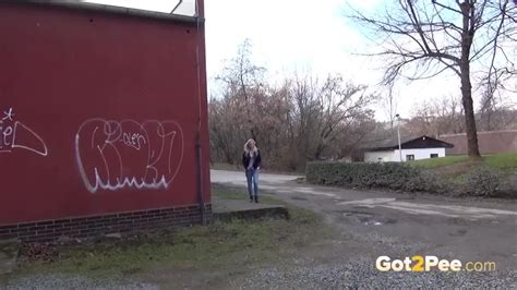 Lovely Fair Haired In Jeans Caught Peeing Outside
