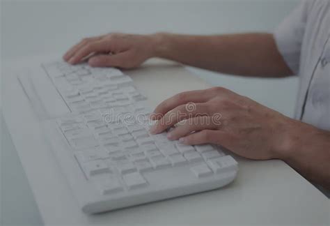Futuristic Woman With Augmented Hands Typing On A High Tech Keyboard Stock Illustration