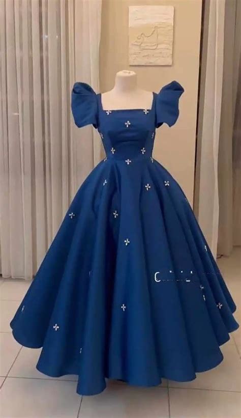 با این مدل لباس‌های مجلسی هم بلند بپوشید و هم عروسکی بمانید چی بپوشم