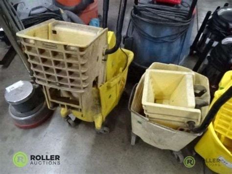 2 Rolling Mop Buckets And 3 Wringers Roller Auctions