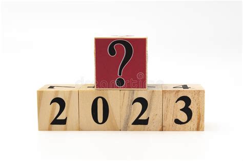 2023 With Question Mark Written On Wooden Blocks In Horizontal
