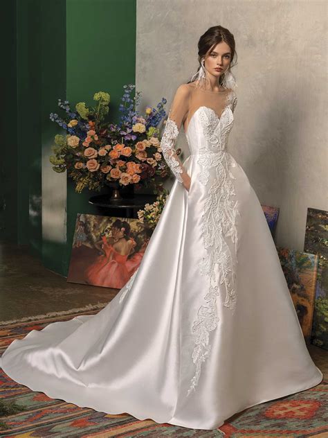 Long Sleeved Ball Gown Wedding Dress With Pockets