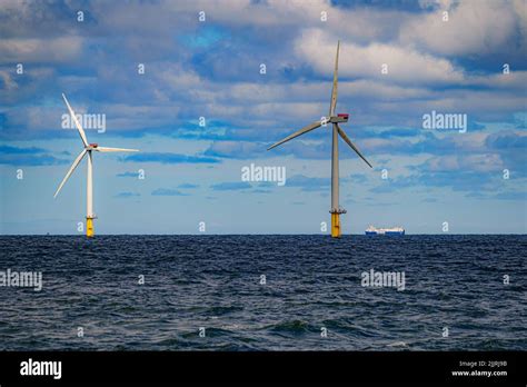 A Ship Passes Wind Turbines At Rwes Gwynt Y Mor The Worlds 2nd