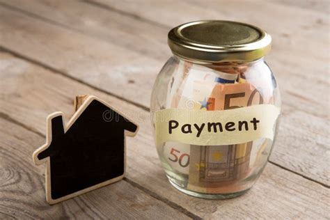 Real Estate Finance Concept Money Glass With Payment Word Stock Image