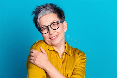 Photo Of Pretty Cheerful Woman Wear Shirt Spectacles Embracing Herself