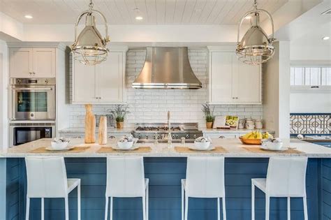 Blue Shiplap Kitchen Island With Sleek White Leather Counter Stools
