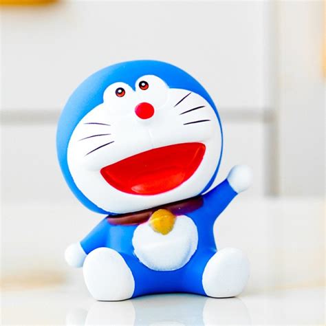 Mô Hình Doremon Ngồi Dơ Tay Cao 9cm Nặng 100gram Figure Doremon No Box Bọc Túi Opp