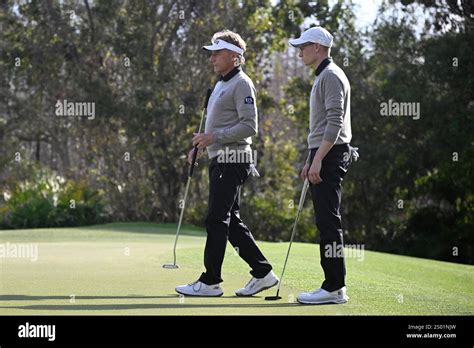 Bernhard Langer Left And His Son Jason Langer Line Up A Putt On The Th Green During The