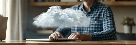 Man Working On Laptop With Cloud Above Concept Of Cloud Computing And Data Storage Stock