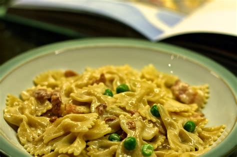Half A Pot Of Cream Farfalle With Carbonara And Spring Peas