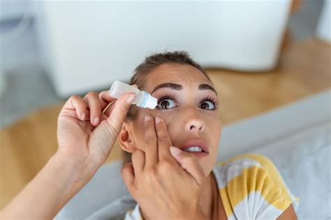 Premium Photo Woman Using Eye Drop Woman Dropping Eye Lubricant To