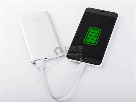 用于为移动设备充电的移动电源带移动电源的白色智能手机充电器电池组移动设高清图片下载 正版图片504170039 摄图网