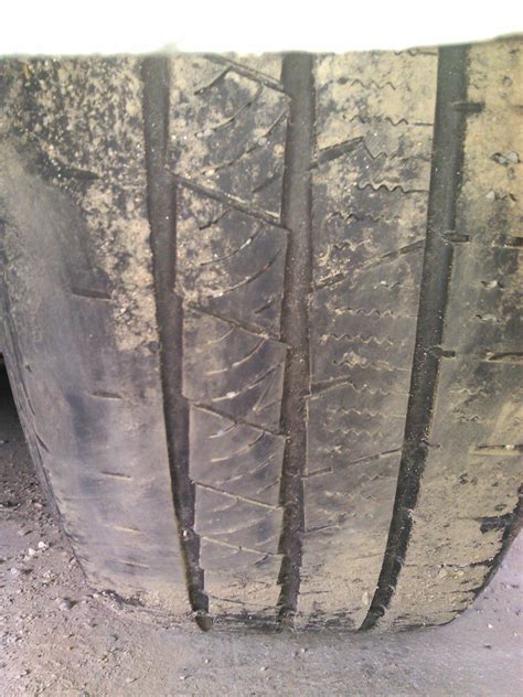 Uneven wear on inside of rear tires. 4x4 Jeep Patriot 25,000 miles. Front tires are fine but ...