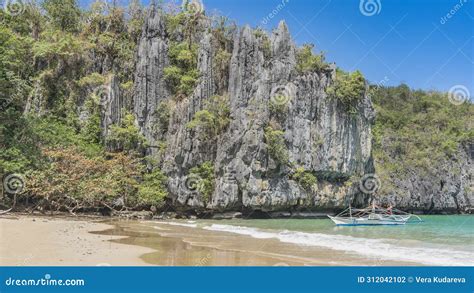 The Traditional Filipino Double Outrigger Dugout Bangka Is Moored