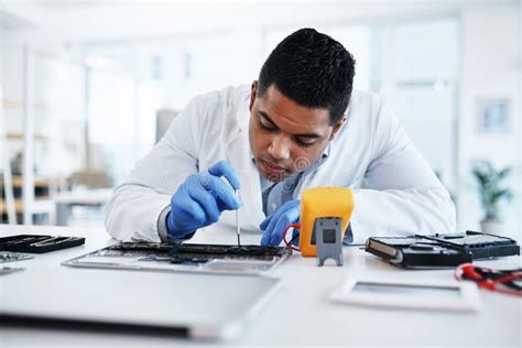 Technology Hardware And Man In Lab With Laptop For Motherboard Maintenance Repair Or