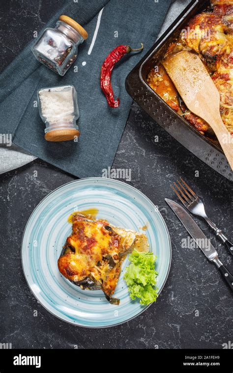 Baked Eggplant With Cheese On A Stone Table Parmigiana Melanzane Top