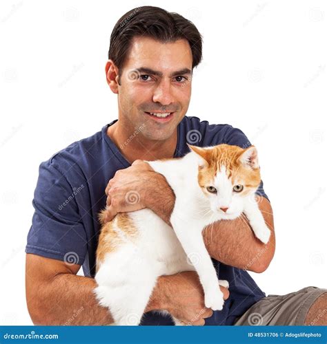 Handsome Man Holding a Cat stock photo. Image of space - 48531706