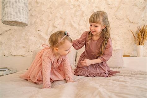 Premium Photo Two Cute Sisters Portrait