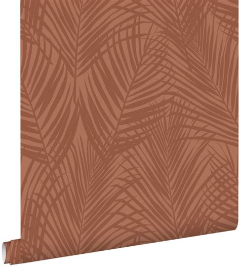 Papier peint feuilles de palmier terracotta ESTAHOME Intissé