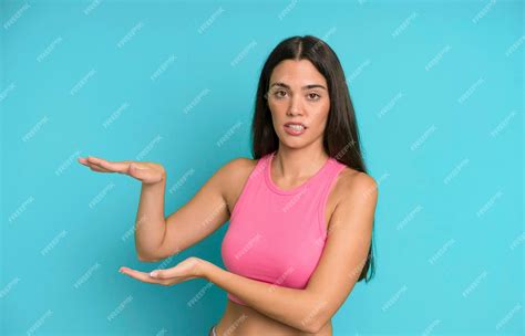 Premium Photo Holding An Object With Both Hands On Side Copy Space