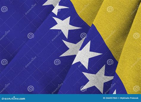 Bosnia And Herzegovina Flag With Big Folds Waving Close Up Under The