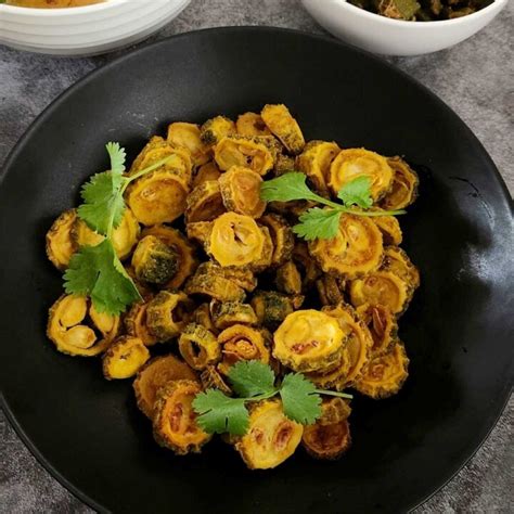Baked Sweet Sour Bitter Gourd Khatta Meetha Karela Living Smart And Healthy