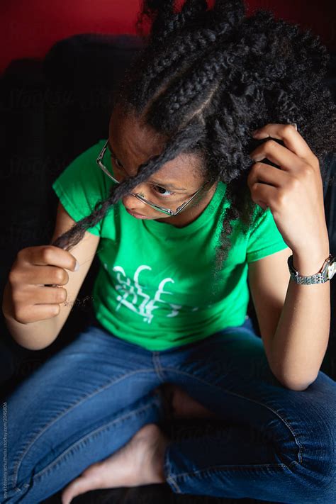 Teenager Combing Her Kinky Curly Hair By Stocksy Contributor Anya