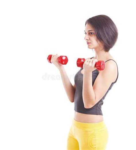 Dumbbells De Levantamento Da Mulher Foto De Stock Imagem De Povos