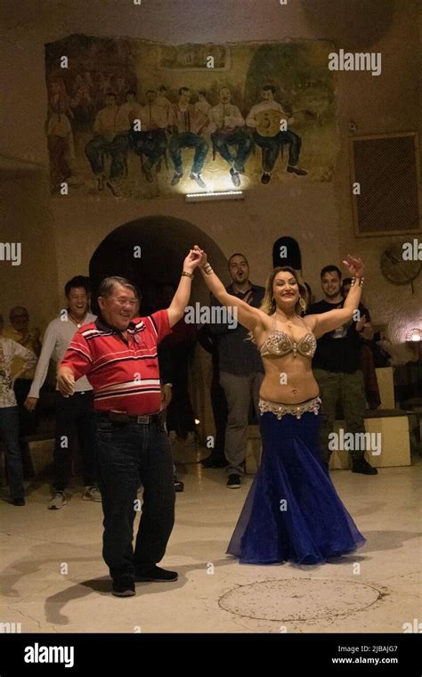 A Turkish Female Dancer Performing A Küçek Belly Dance For Tourists In