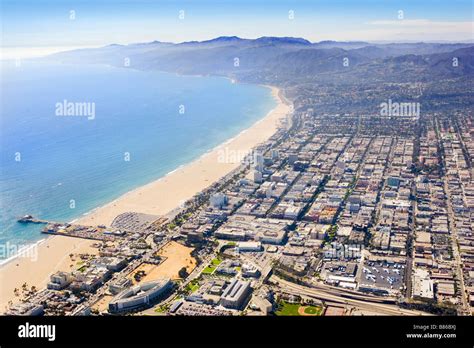 Downtown Santa Monica Pier And Beach With Santa Monica Mountains Aerial