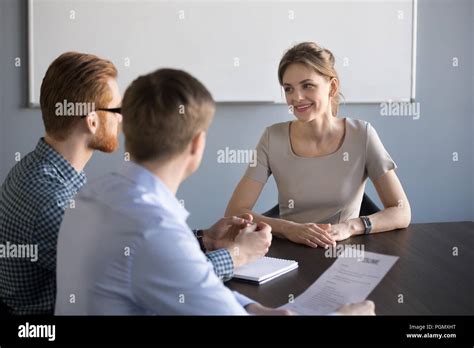Smiling Female Applicant Interview With Male Recruiters In Offic Stock Photo Alamy