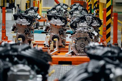 Car Engine In Production And Assembly Passenger Car Workshop Stock