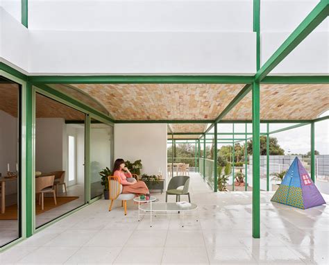 Space Populars Brick Vault House Slots Into Slender Green Grid