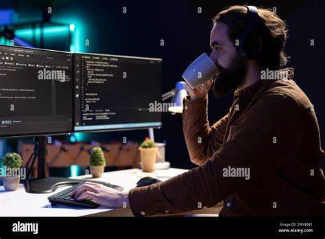Cybersecurity Specialist Drinking Coffee While Looking For Company