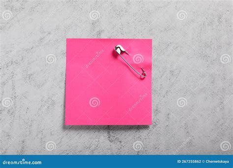 Pink Paper Note With Safety Pin On Grey Textured Background Top View Stock Photo Image Of