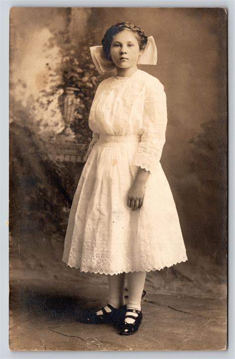 Postcard Rppc Stoic Young Woman In Lacy White Gown Real Photo Hair Bow