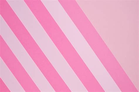 분홍색 줄무늬 종이 배경 줄무늬 기하학적 배경 종이 추상 텍스처래핑 페이퍼 색상 차단 배경밝은 핑크 줄무늬 롤리팝 배경 0명에