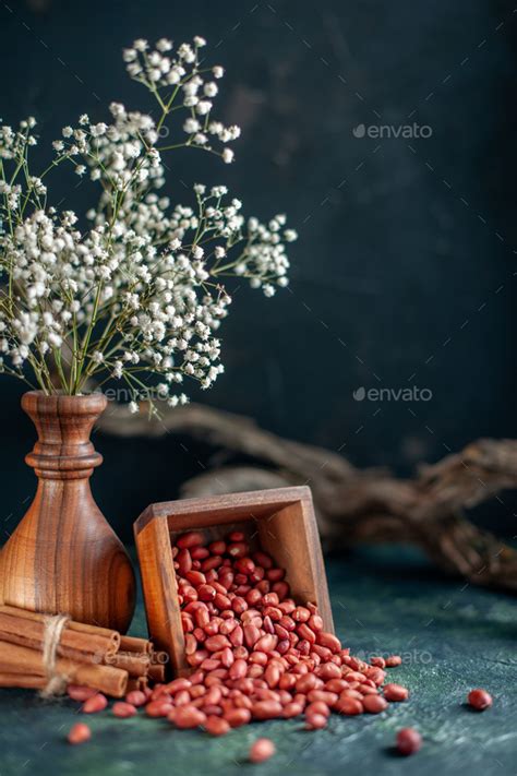 Front View Clean Peeled Peanuts On The Dark Blue Background Shell