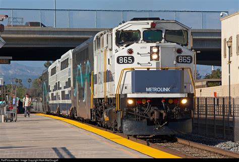 Metrolink 117 Departs Camarillo Behind An F59PH In The Original Metrolink Scheme Commuter