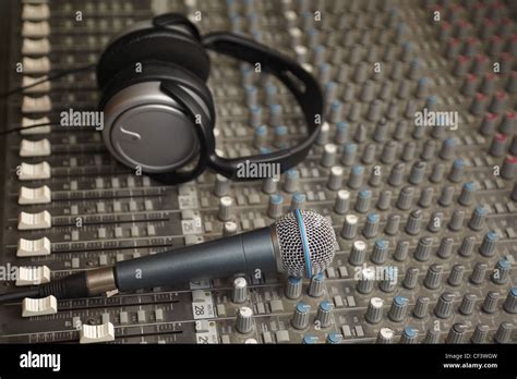 Headphones And Microphone On Old Dirty Sound Mixer Pult Microphone In Focus Stock Photo Alamy