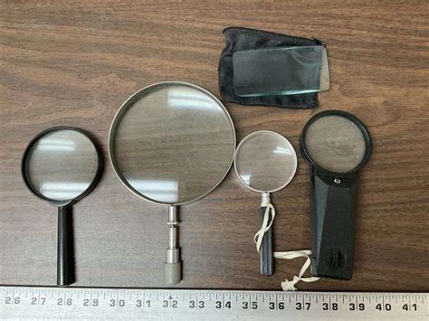 Magnifying Glasses Legacy Auction Company