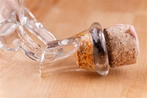 Broken Glass Bottle With Cork On Wooden Table Broken Structure Stock