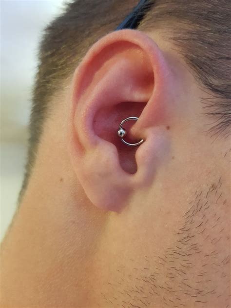 Pin By Juarez On Tattoo Daith Piercing Men Daith Piercing Ear Piercings
