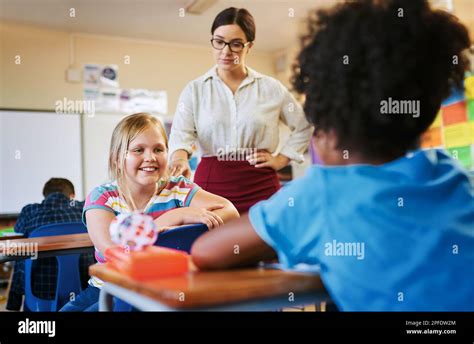 No Talking In My Class Please A Young Attractive Teacher Disciplining