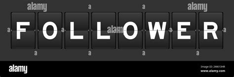 Black Color Analog Flip Board With Word Follower On Gray Background