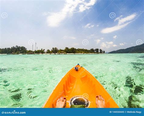 Kayaking In Crystal Clear Tropical Waters Kayak Heading To Beach In