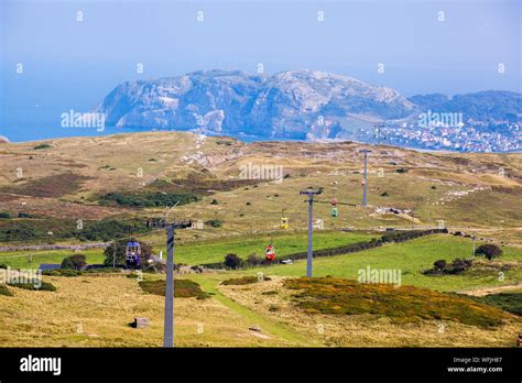 The Colourful Llandudno Cable Car As It Passes Over The Great Orme