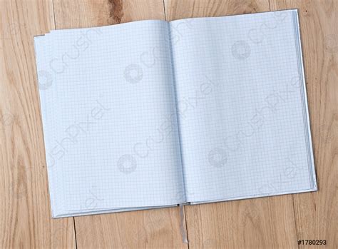 Open Notebook With A Cell With Empty Sheets Stock Photo Crushpixel