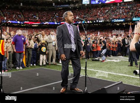 Singer John Boutte Performing The National Anthem During Pregame Ceremonies Before The New